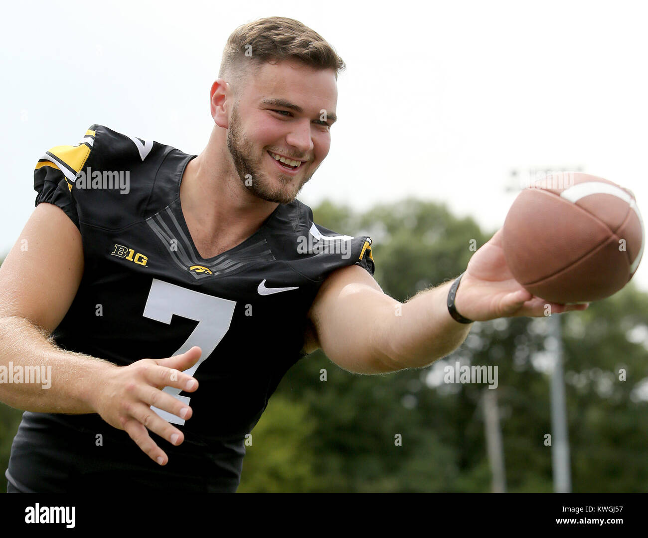 Iowa City, Iowa, USA. 5th Aug, 2017. Iowa punter Colten Rastetter goes ...