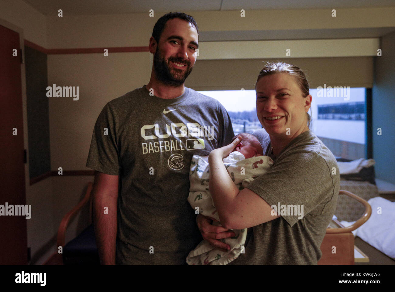 Davenport, Iowa, USA. 25th Dec, 2016. Parents Hana and Brian Strickler ...