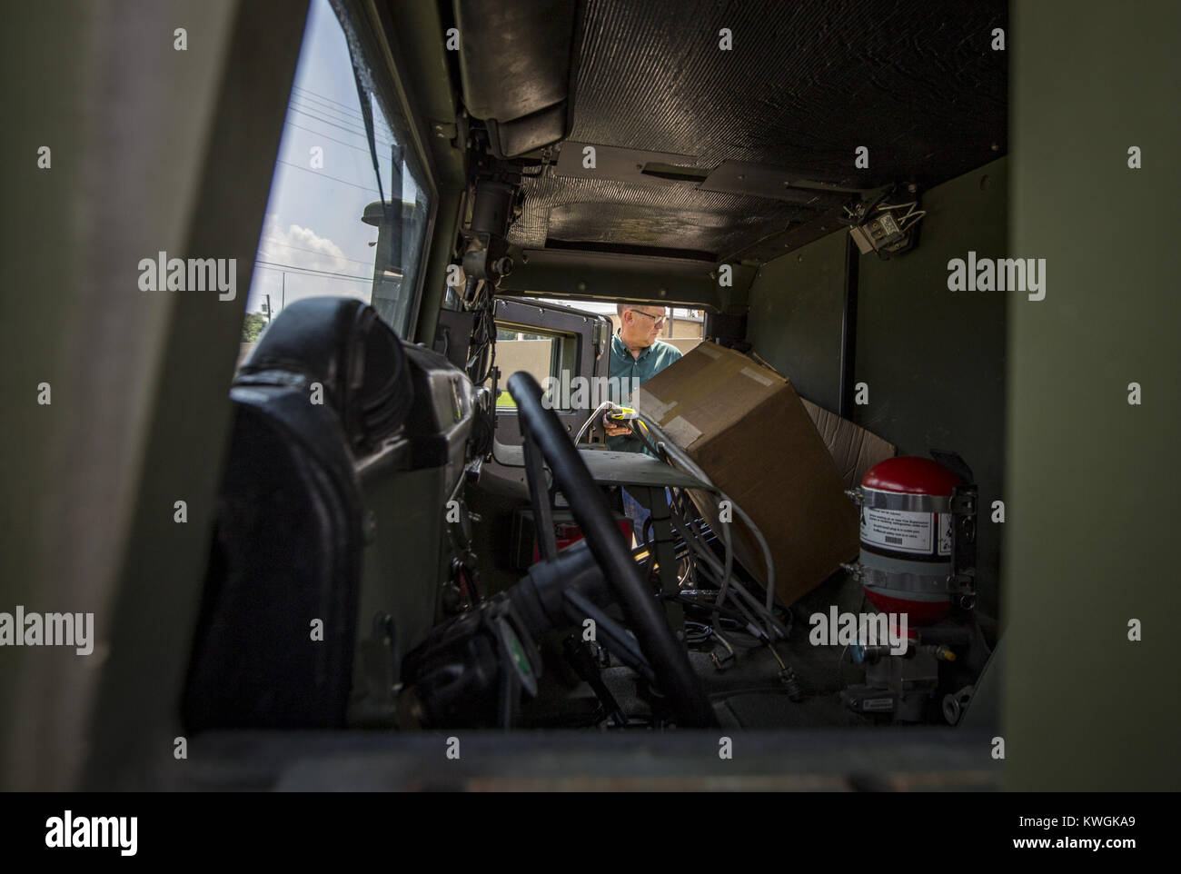 Rock Island, Iowa, USA. 19th July, 2017. Co-Owner Kris Jansen operates ...