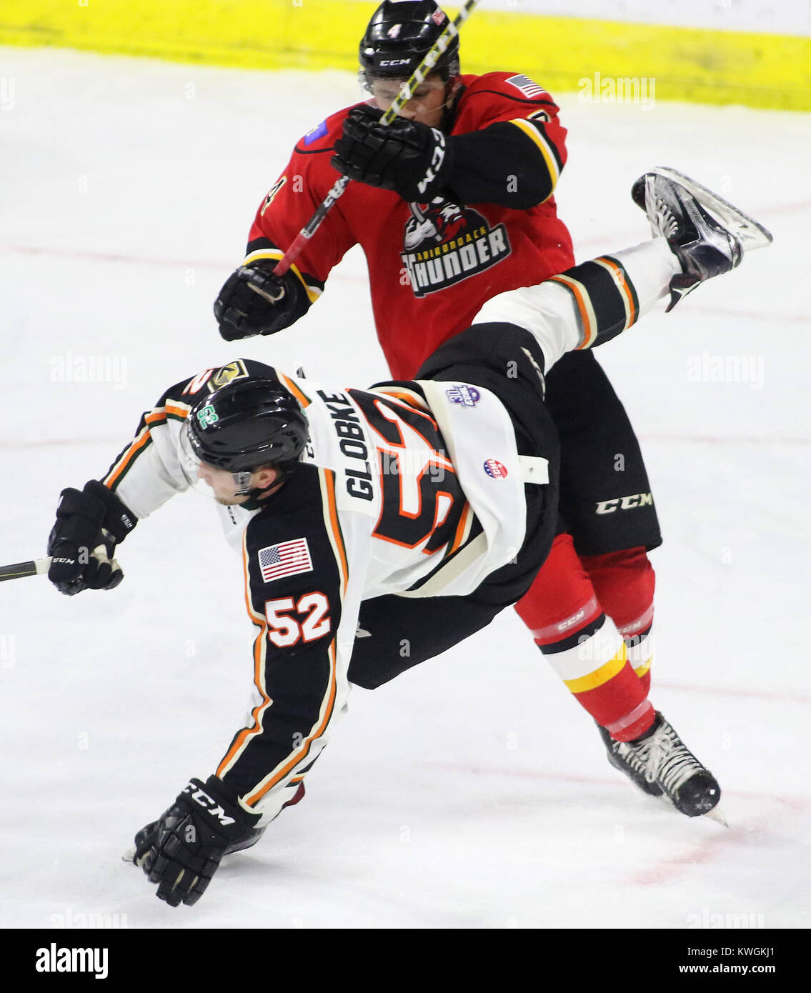 Moline, Iowa, USA. 8th Nov, 2017. Adirondack's Kevin Lough collides ...