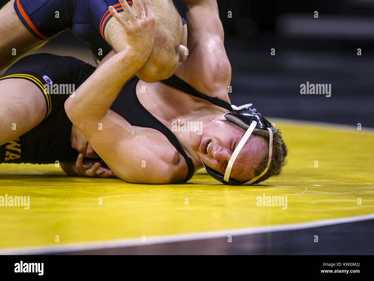 Iowa City, Iowa, USA. 1st Dec, 2017. Iowa's Kaleb Young finds himself ...