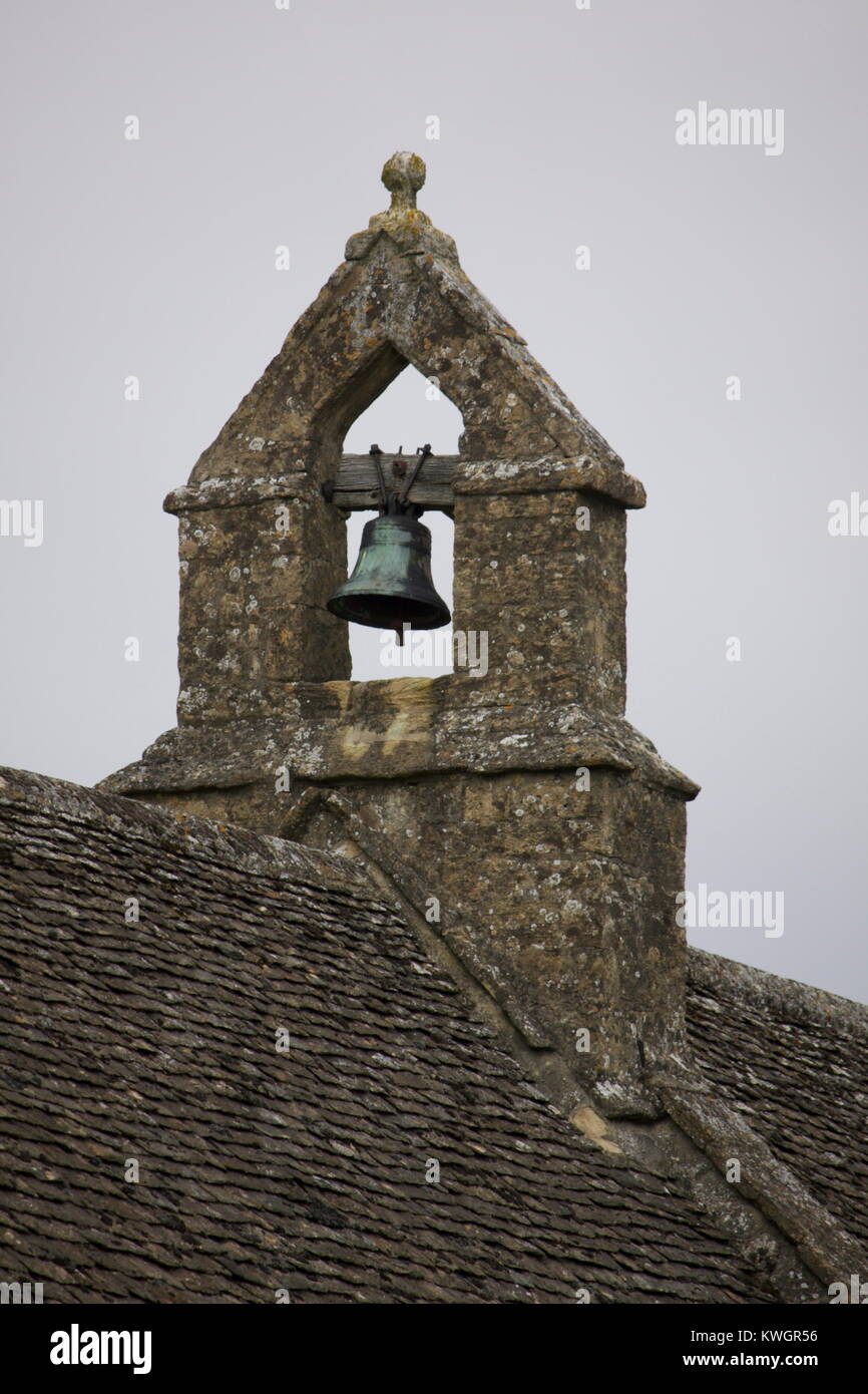 Ancient Church with outside bell, Cotswolds, Oxfordshire Stock Photo ...