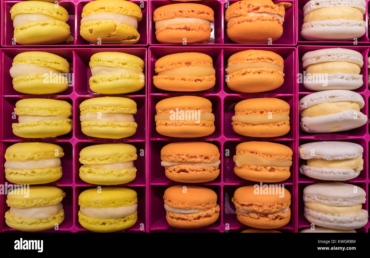 Yellow, orange and white French macaron photographed from above Stock ...