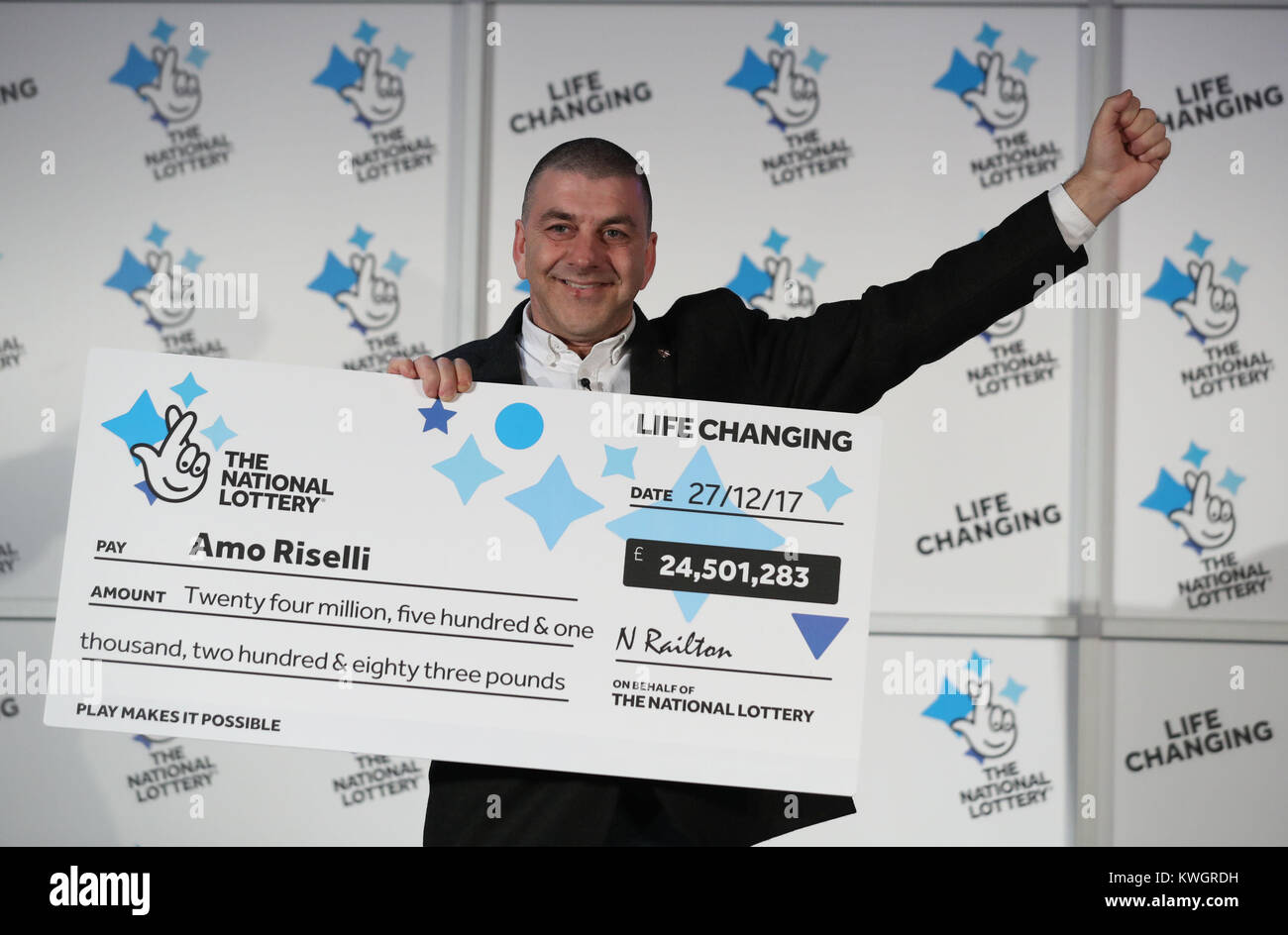 Taxi driver Amo Riselli, 50, celebrating during a photocall at ...