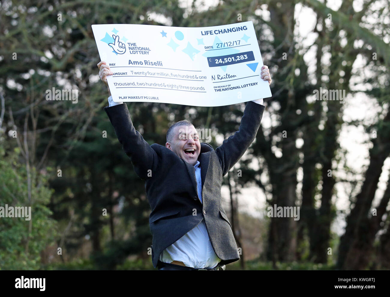 Taxi driver Amo Riselli, 50, celebrating during a photocall at ...
