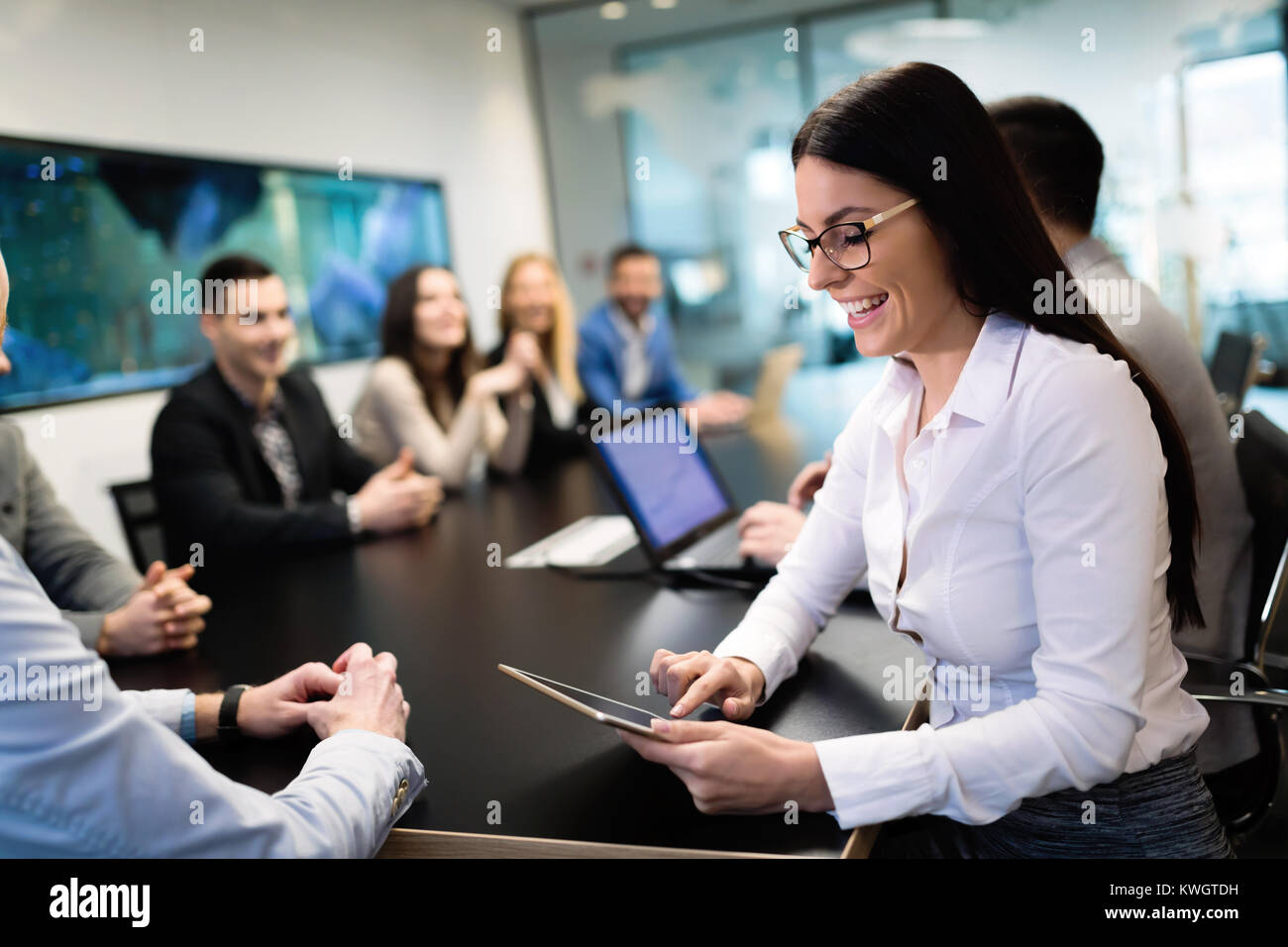 Portrait of young businesswoman in conference room Stock Photo - Alamy