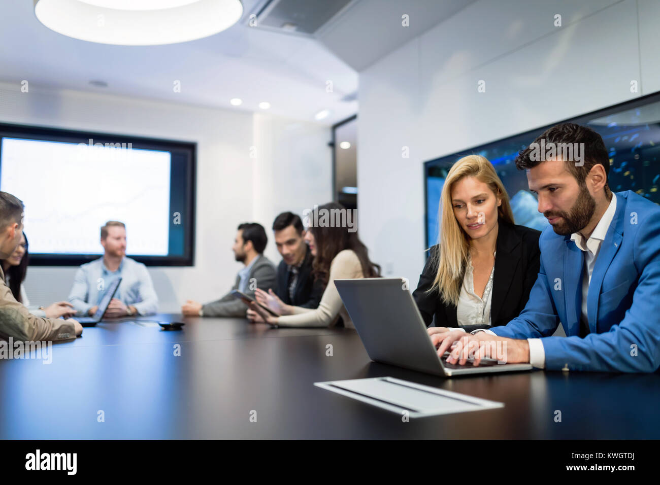 Male female business couple meeting hi-res stock photography and images ...