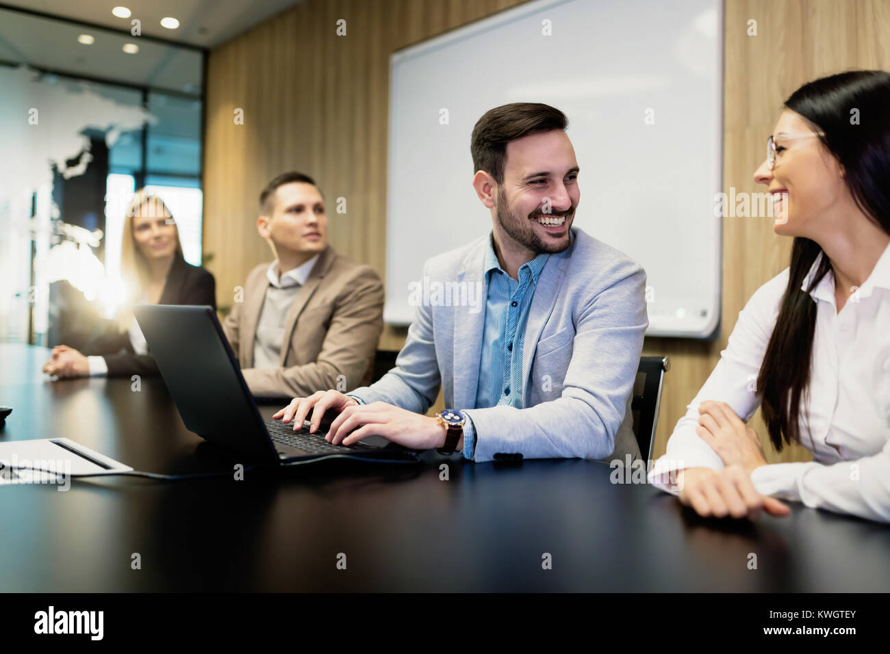 Portrait of business couple in conference room Stock Photo - Alamy