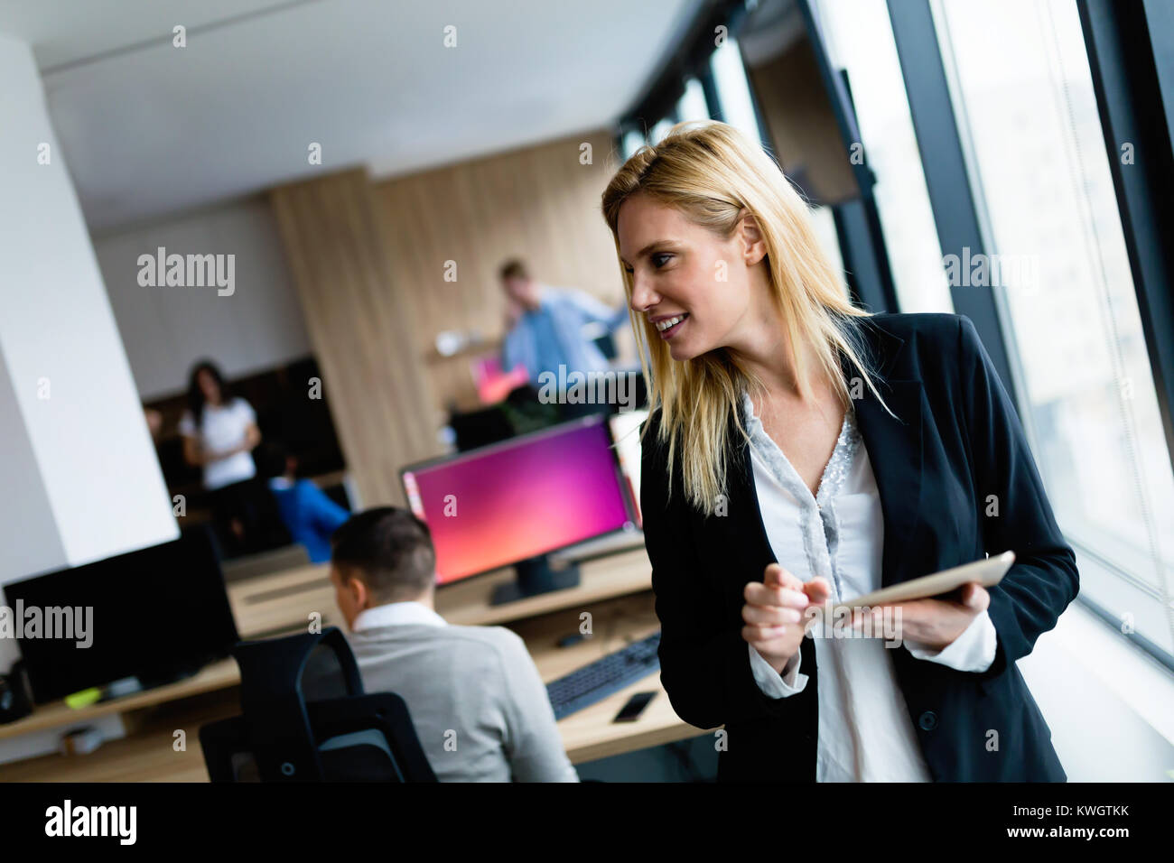 Portrait of successful businesswoman holding digital tablet Stock Photo ... Portrait of successful businesswoman holding digital tablet Stock Photo ...