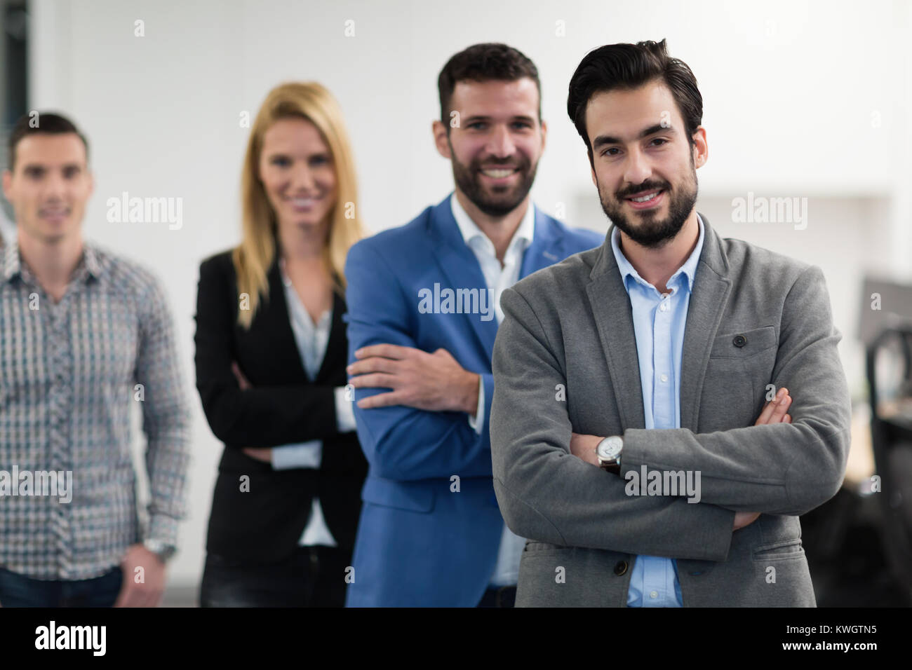 Successful team of young perspective businesspeople in office Stock ...