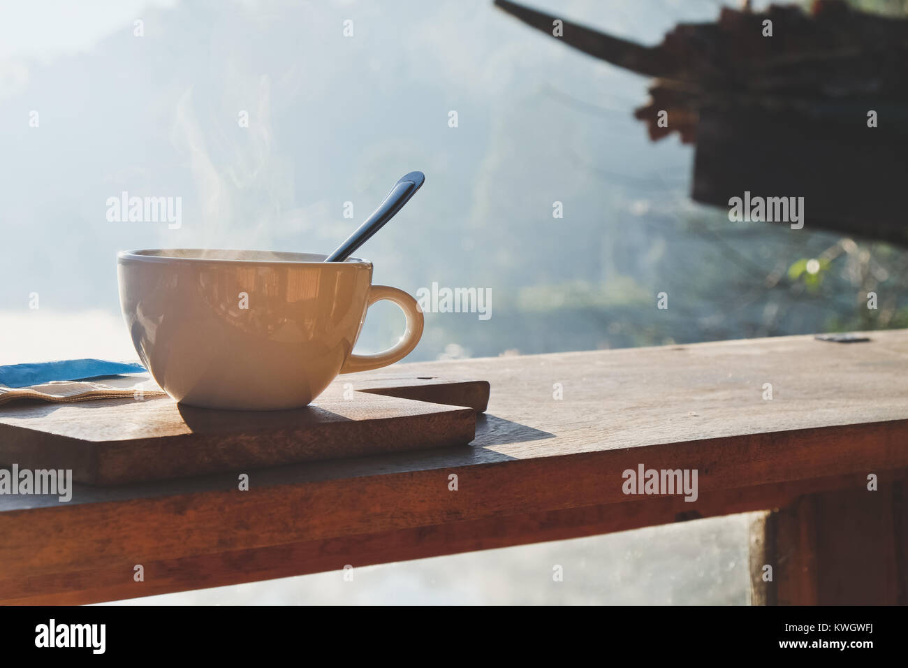 Cup of morning coffee with nature background Stock Photo - Alamy