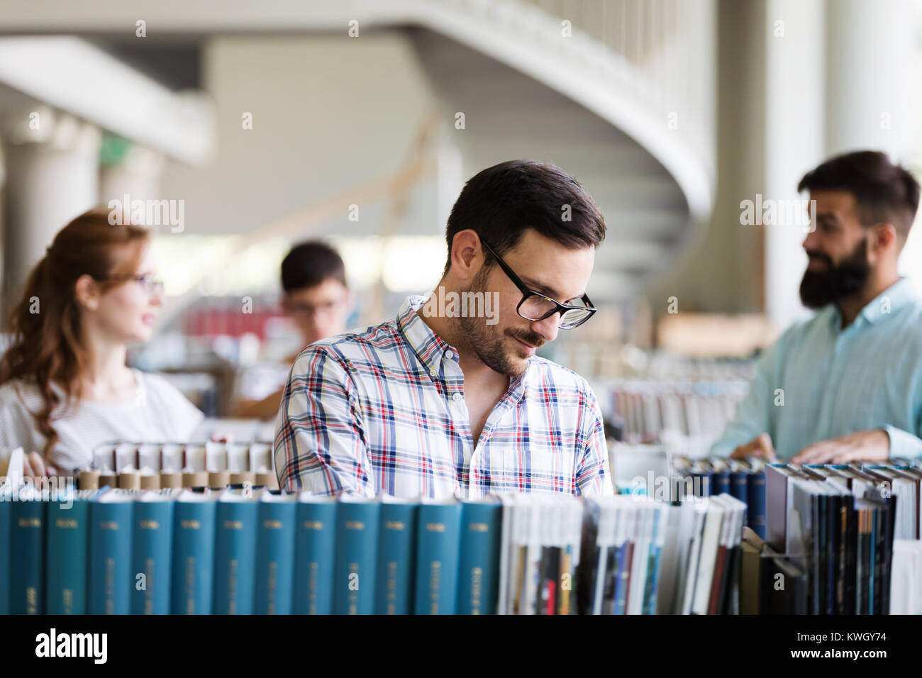 Group of college students studying Stock Photo - Alamy