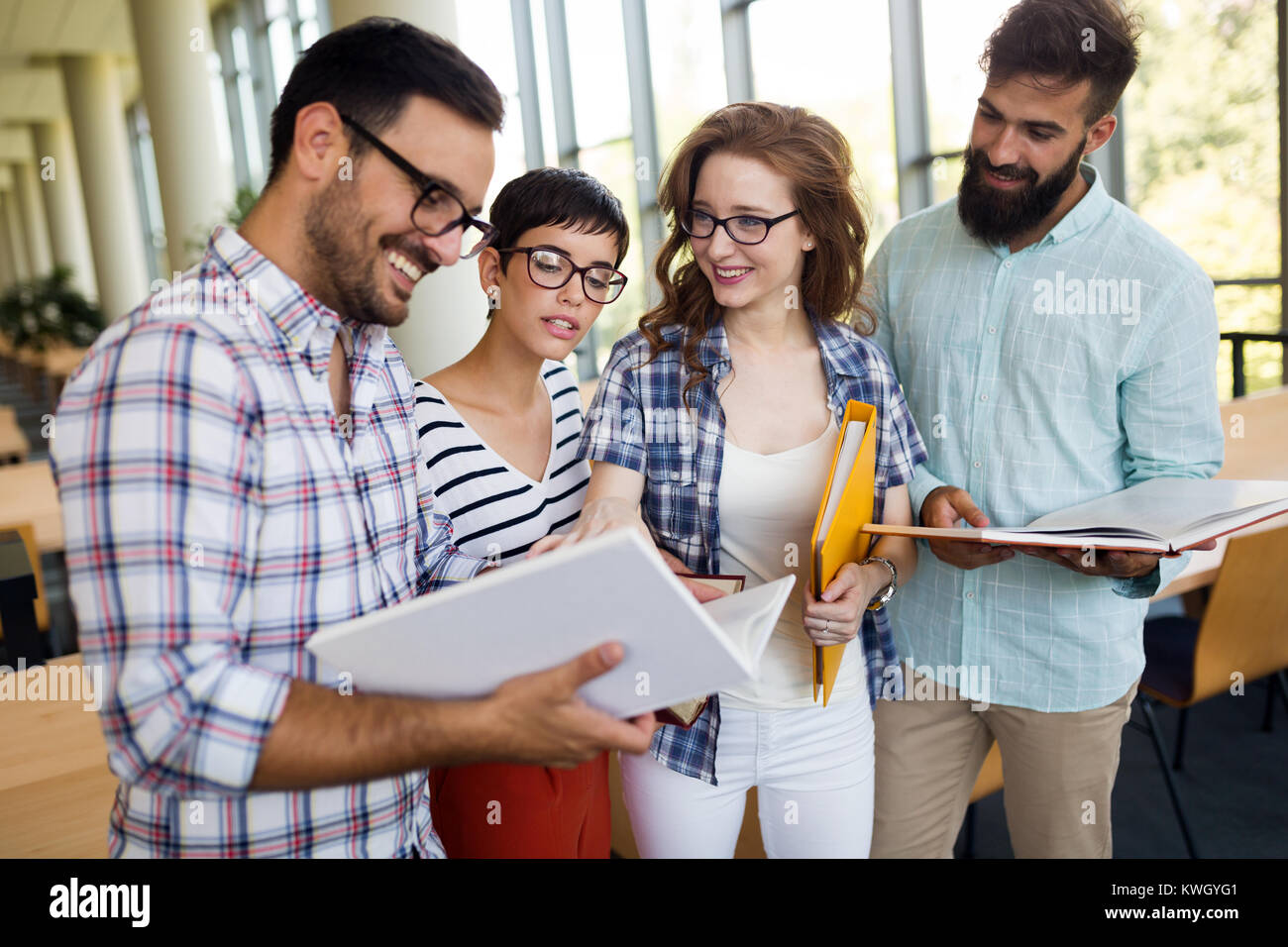 Group of college students working together in the school Stock Photo ...
