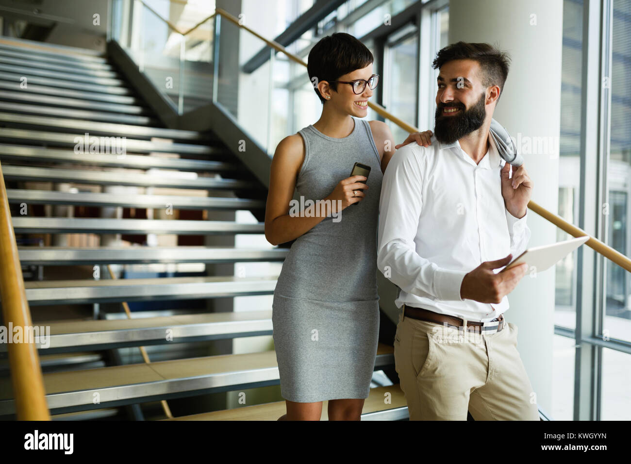 Picture of handsome man and beautiful woman as business partners Stock ...