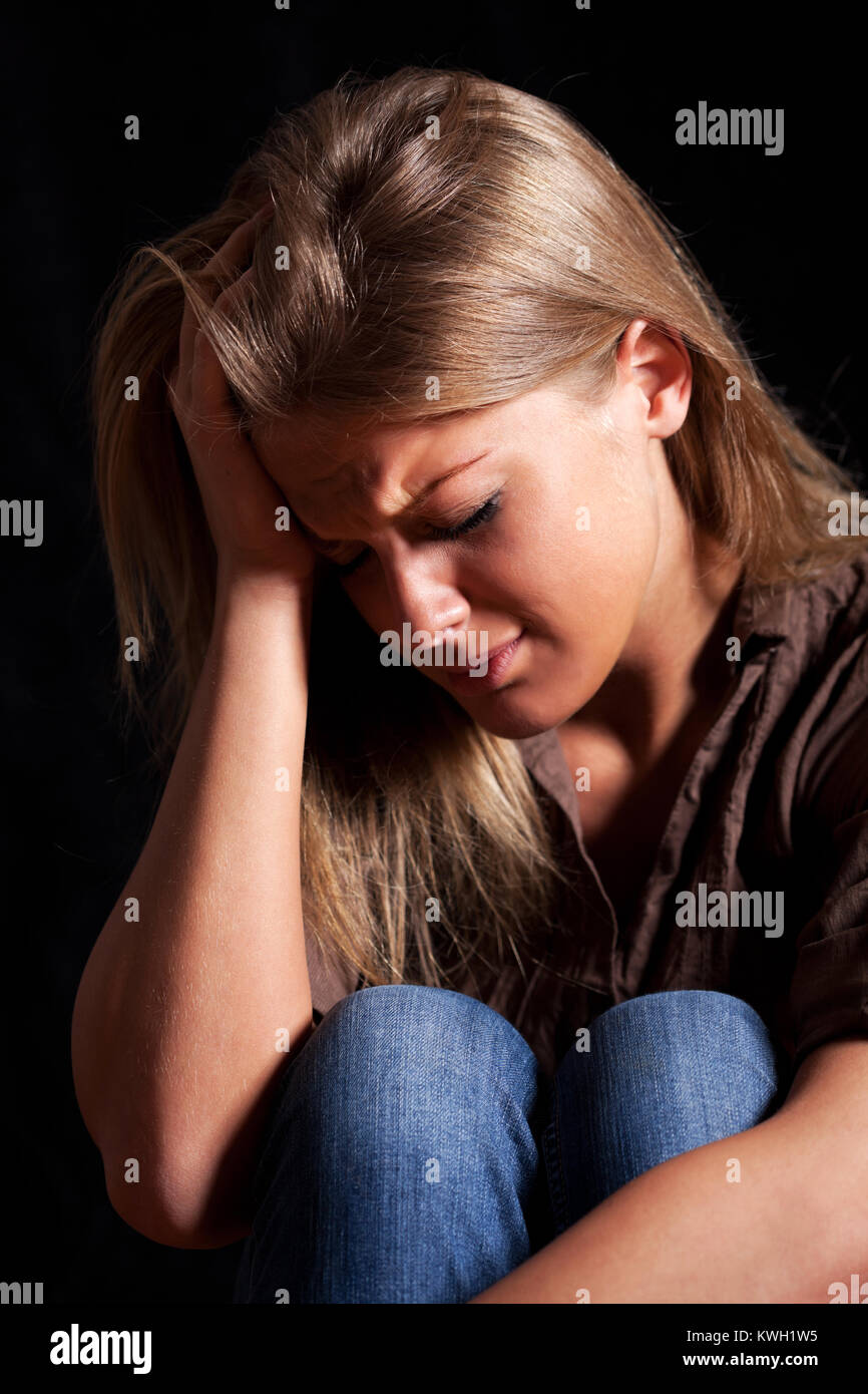 Portrait of depressed woman Stock Photo - Alamy