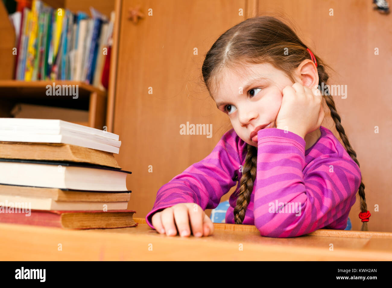 Preschooler child drawing in her room Stock Photo - Alamy