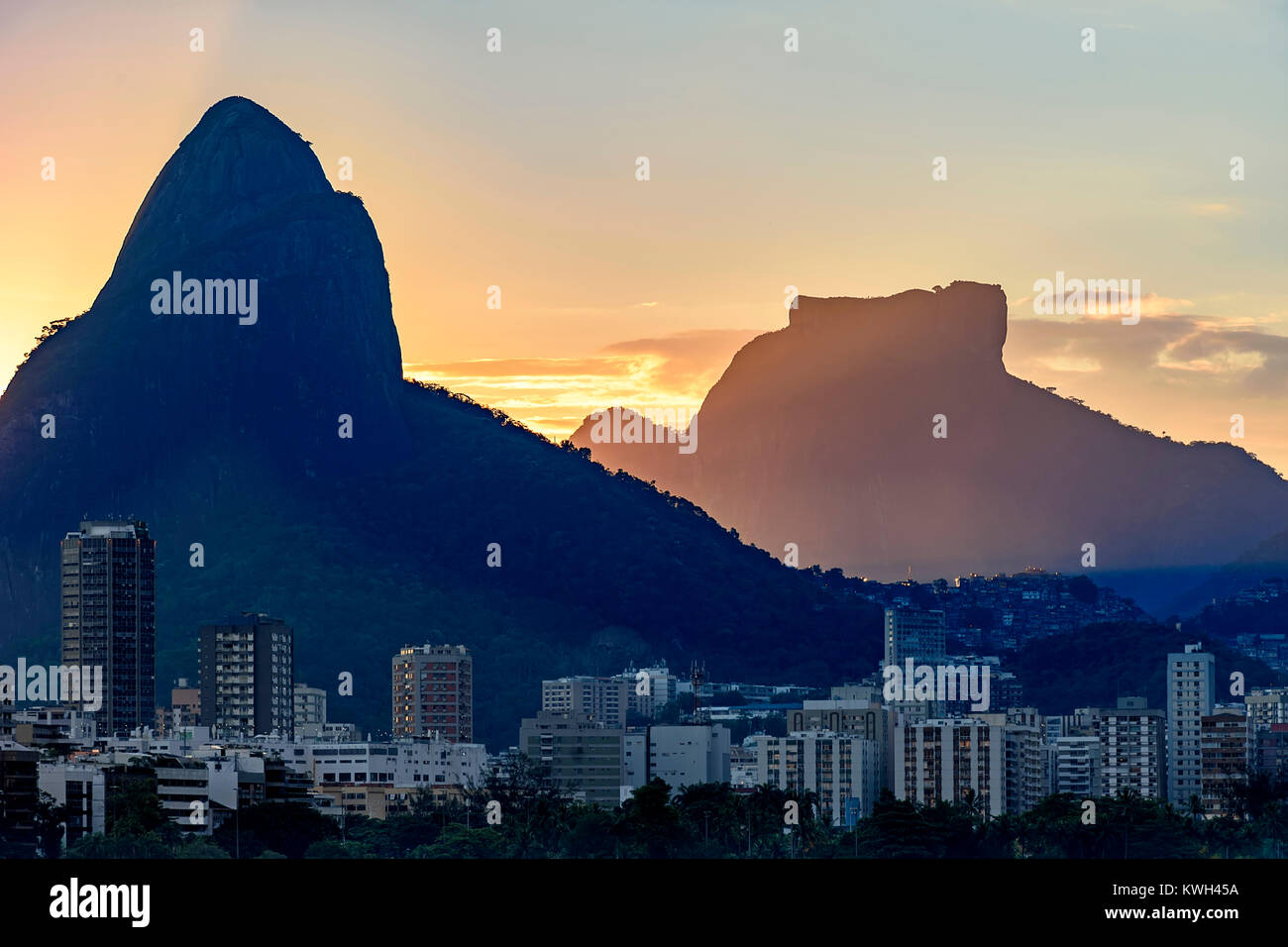 Buildings in Rio de Janeiro with the Two Brothers hill, Gavea stone in ...