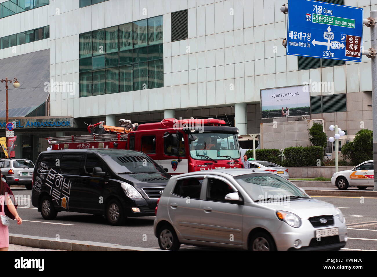 Busy Street movement at downtown Busan, South Korea. Korean Fire truck ...