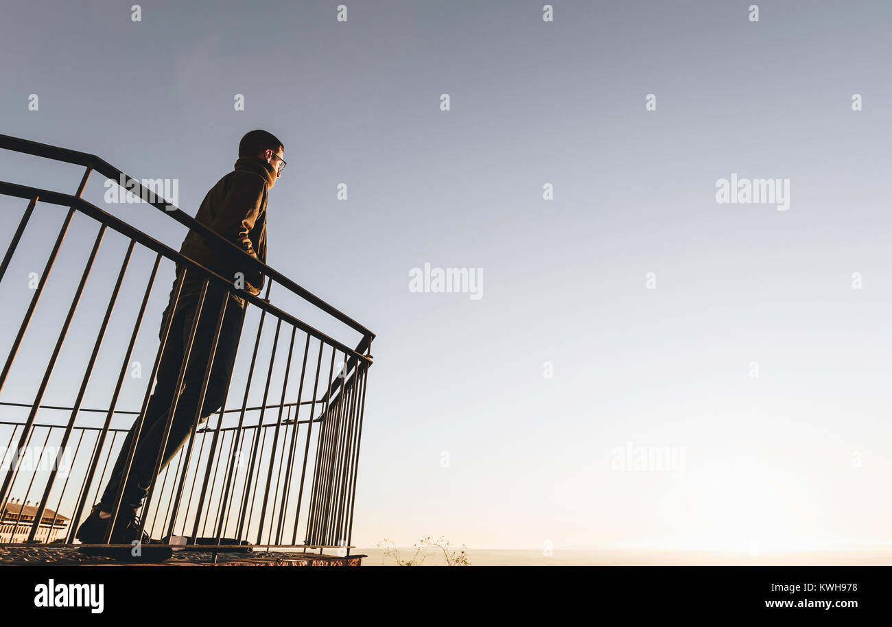Boy on the lookout Stock Photo - Alamy