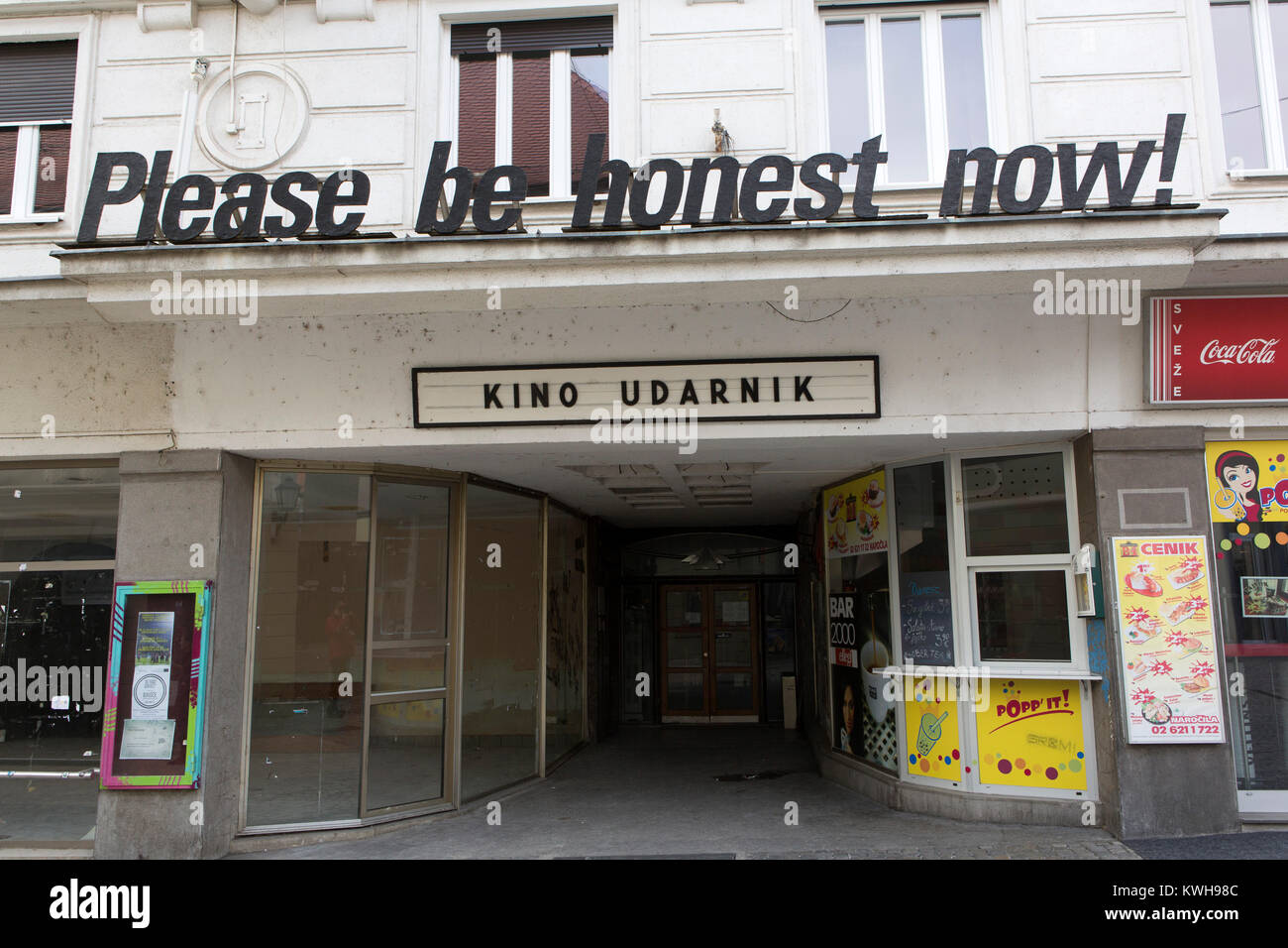 The Kino Udarnik in Maribor, Slovenia. A sign state 'please be honest ...