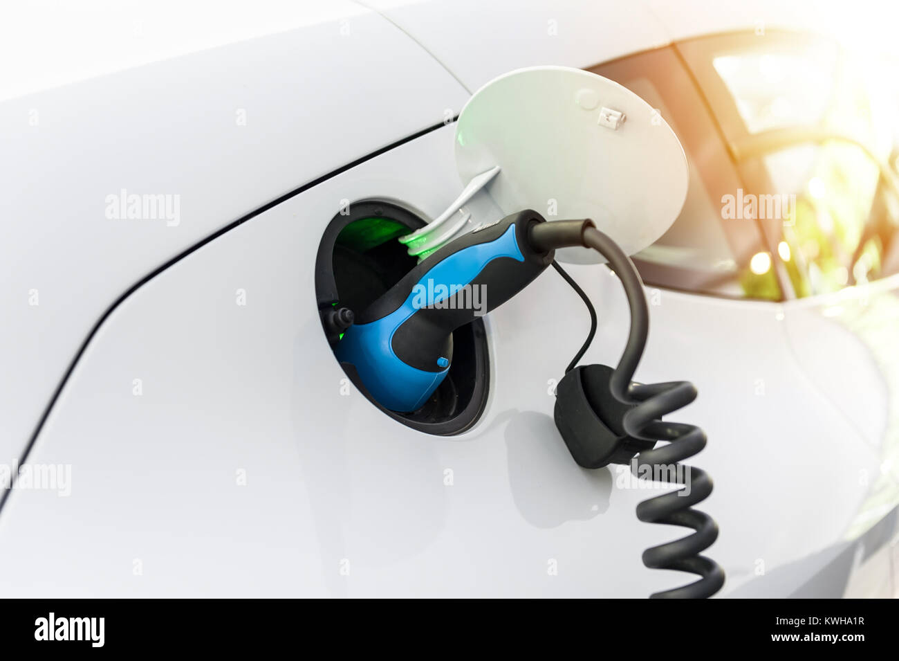Power supply for electric car charging in sunlight Stock Photo - Alamy
