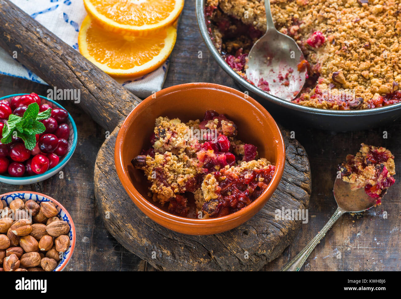 Cranberry, apple and hazelnut crumble - high angle view Stock Photo - Alamy