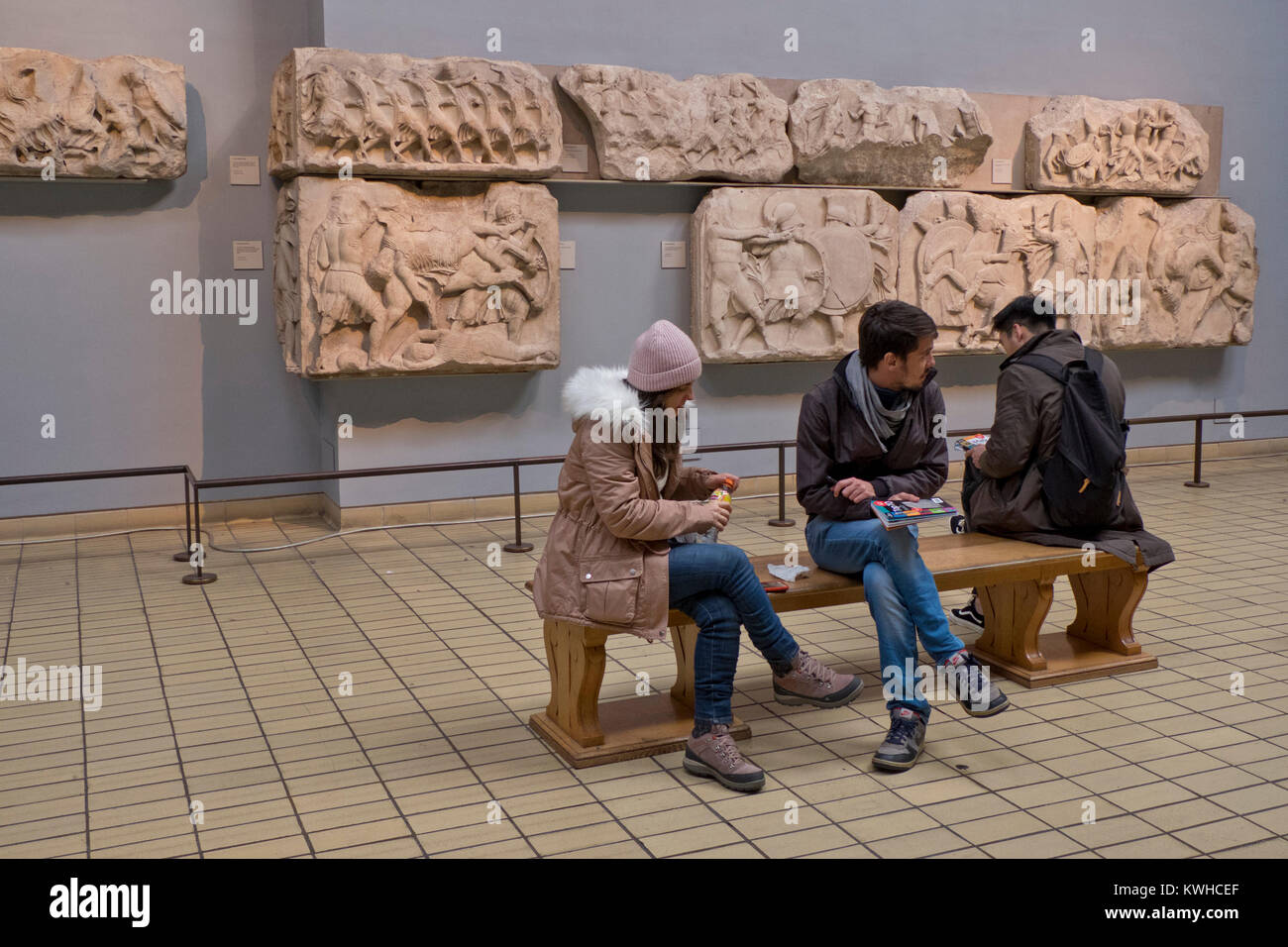Visitors to the Elgin marbles from the Athens Parthenon gallery at the British Museum in London ...