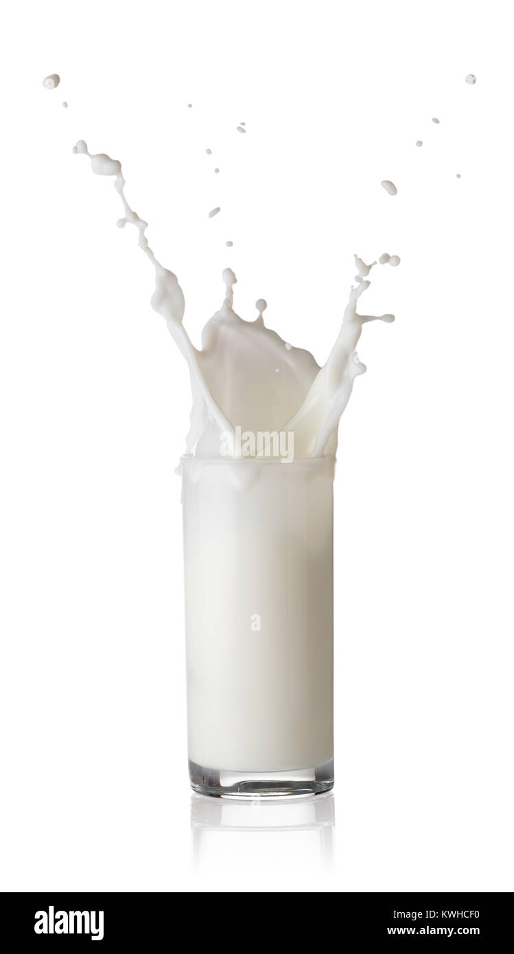 Splash in a glass of milk Stock Photo - Alamy