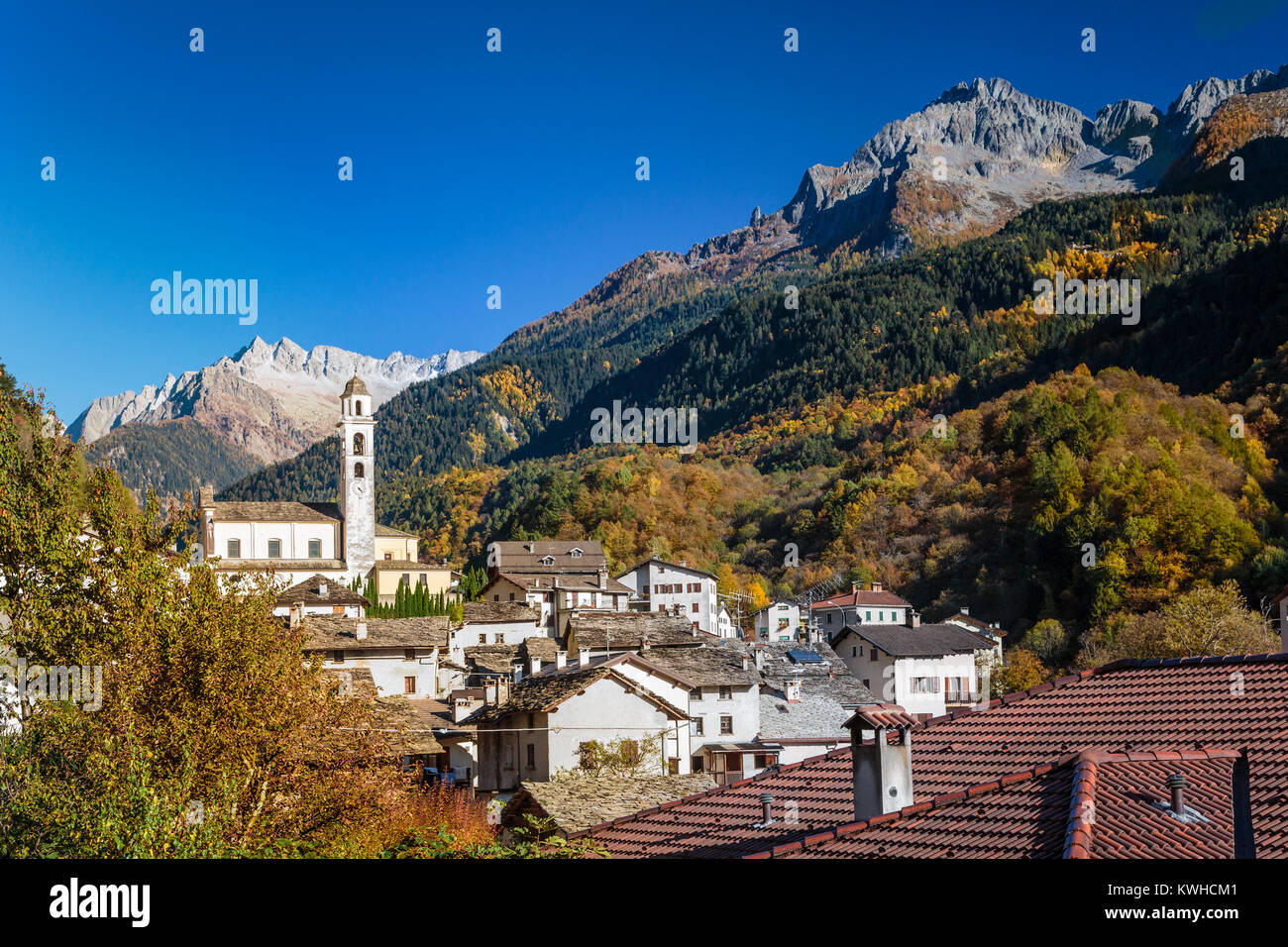 A small village with fall foliage color in the mountains in northern ...