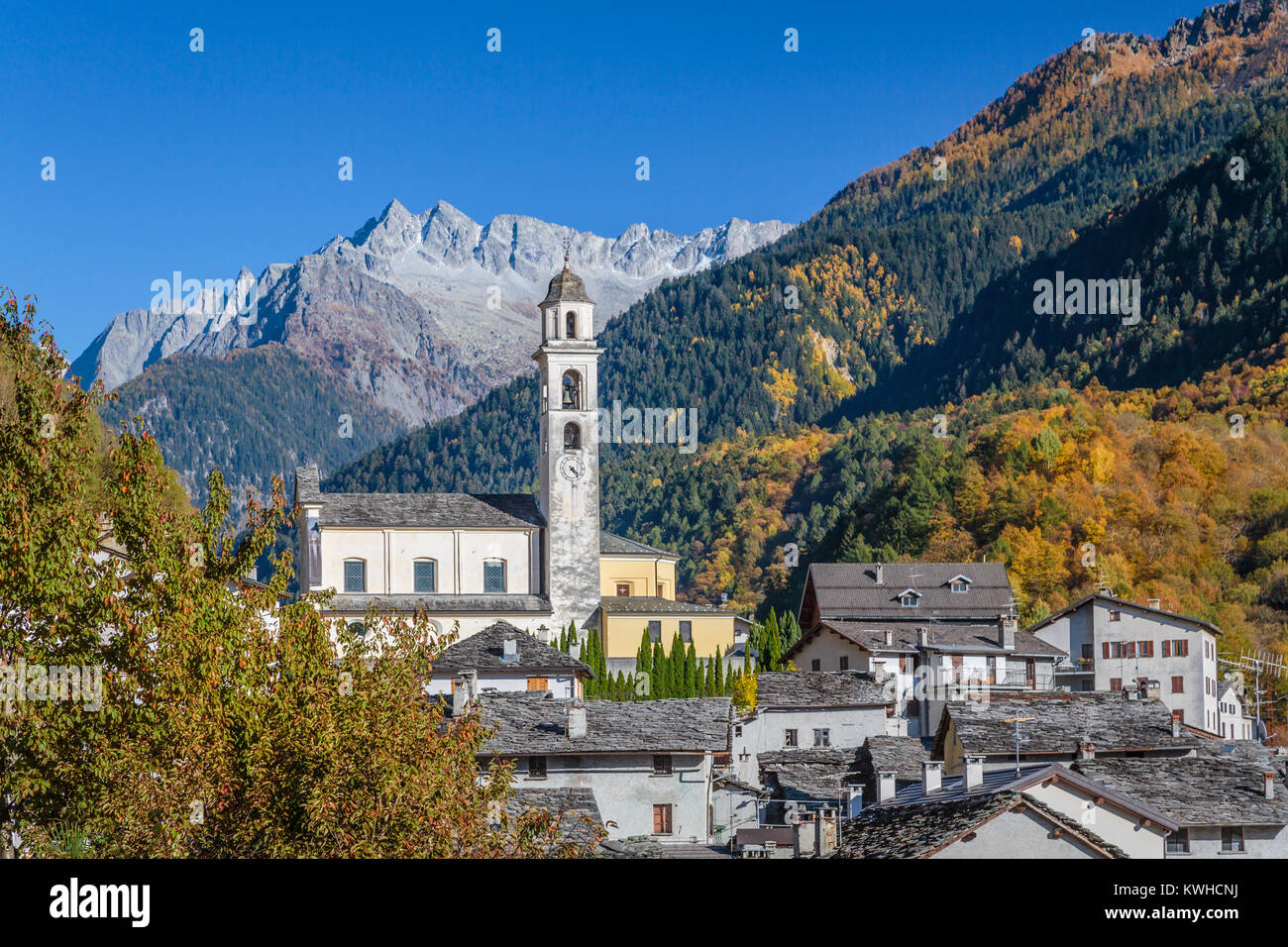 A small village with fall foliage color in the mountains in northern ...