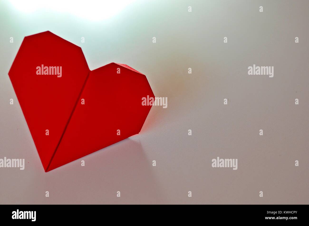 Origami red heart withe background for design Stock Photo - Alamy