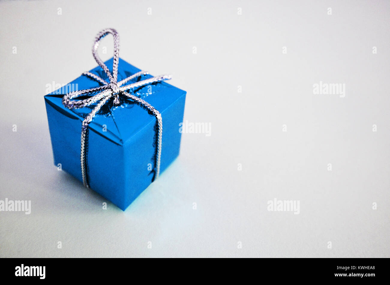 Gift box with ribbon Stock Photo - Alamy