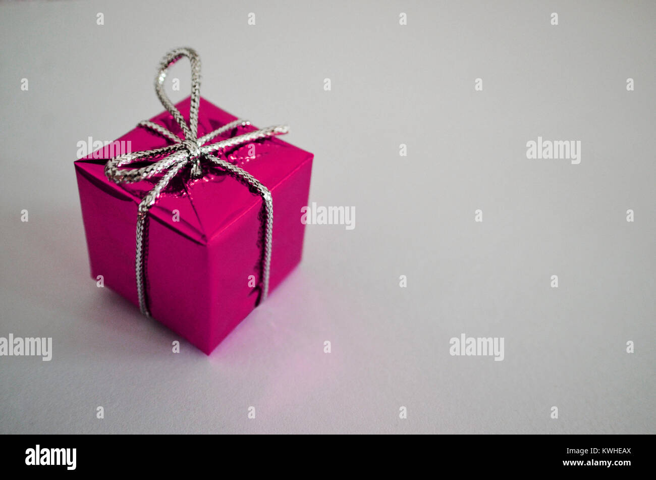 Gift box with ribbon Stock Photo - Alamy