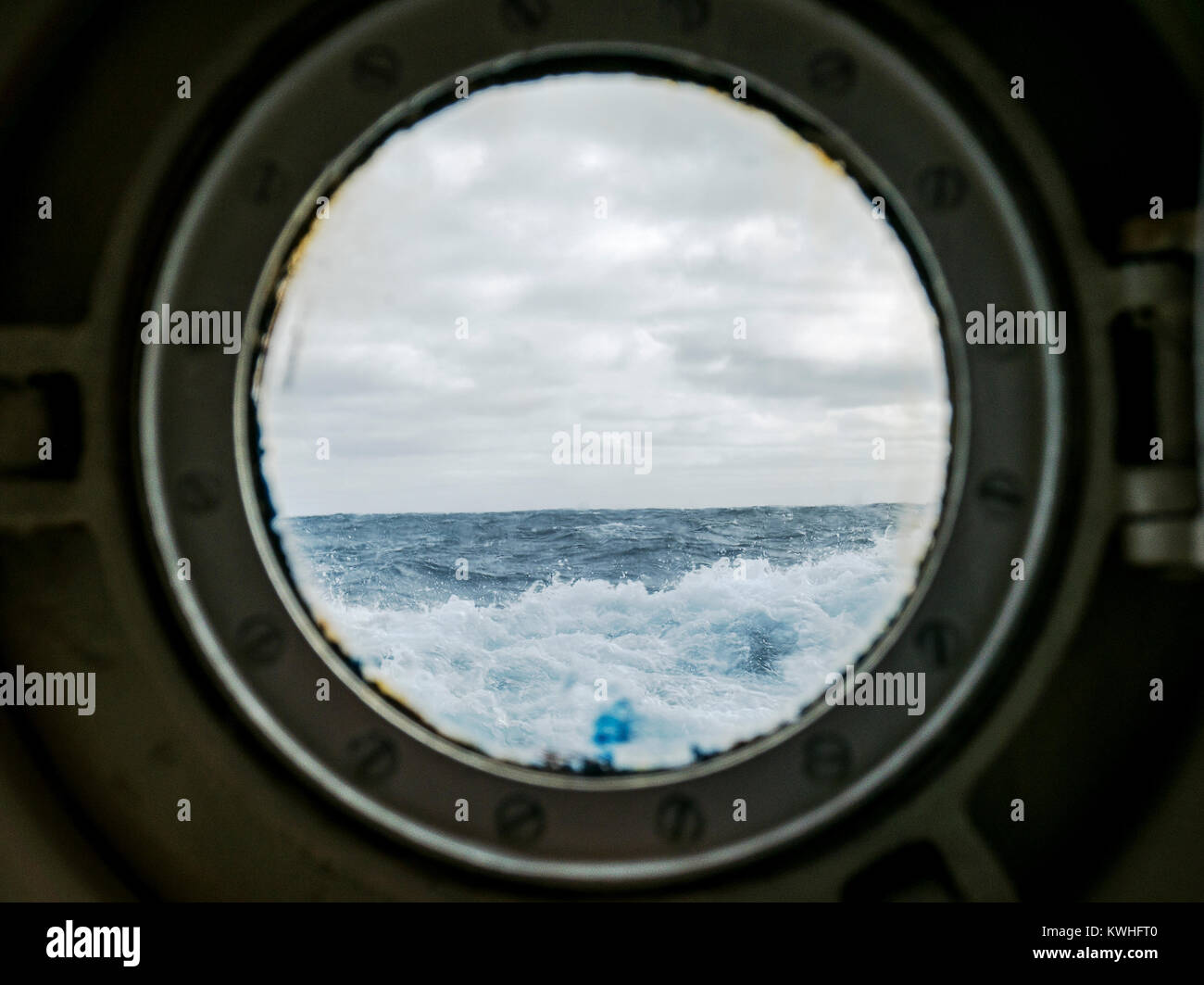 Ocean Adventurer ship port hole view of rough Drake Passage; Pasaje de ...