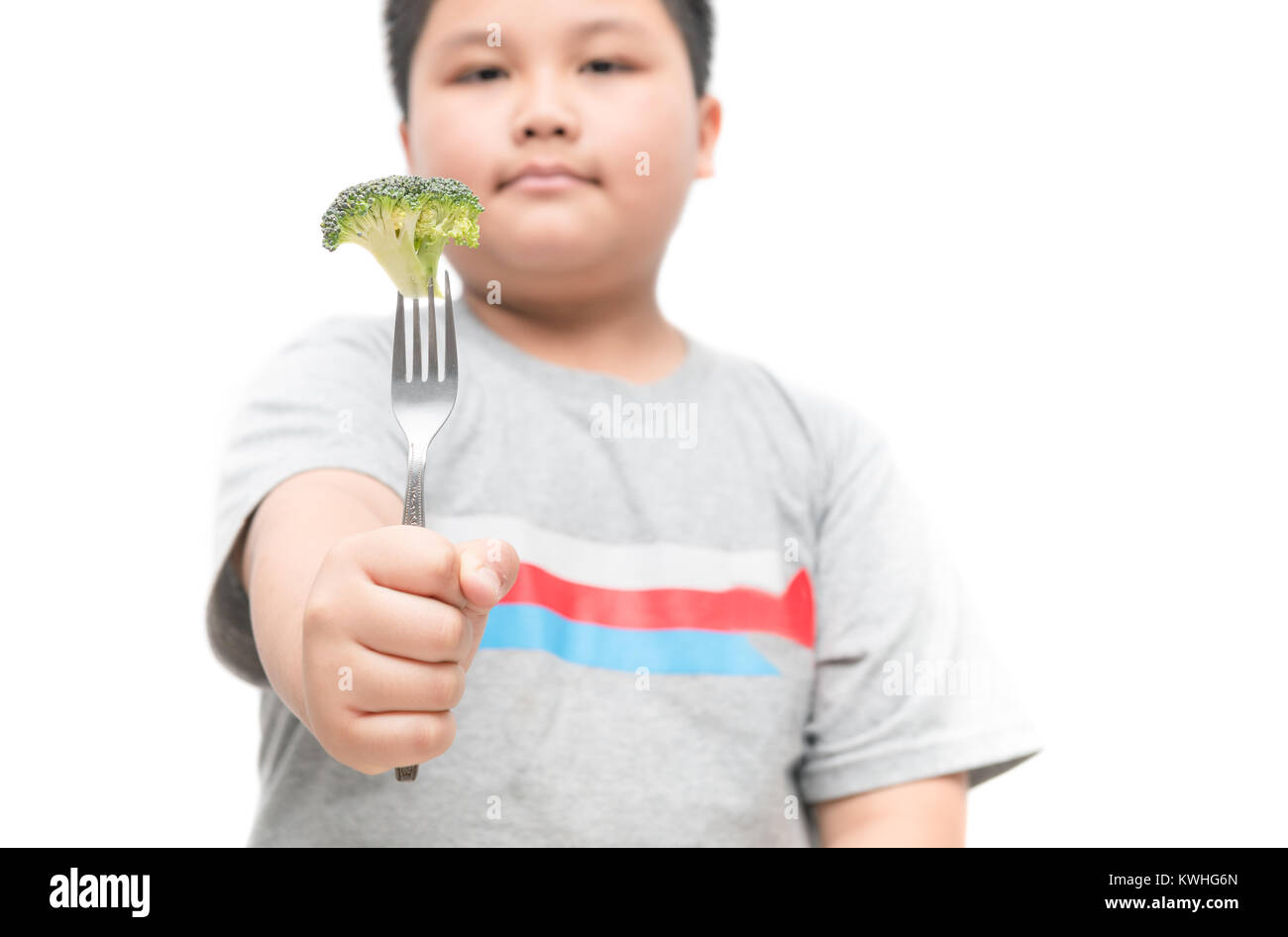 broccoli on hand obese fat boy isolated on white background, healthy ...