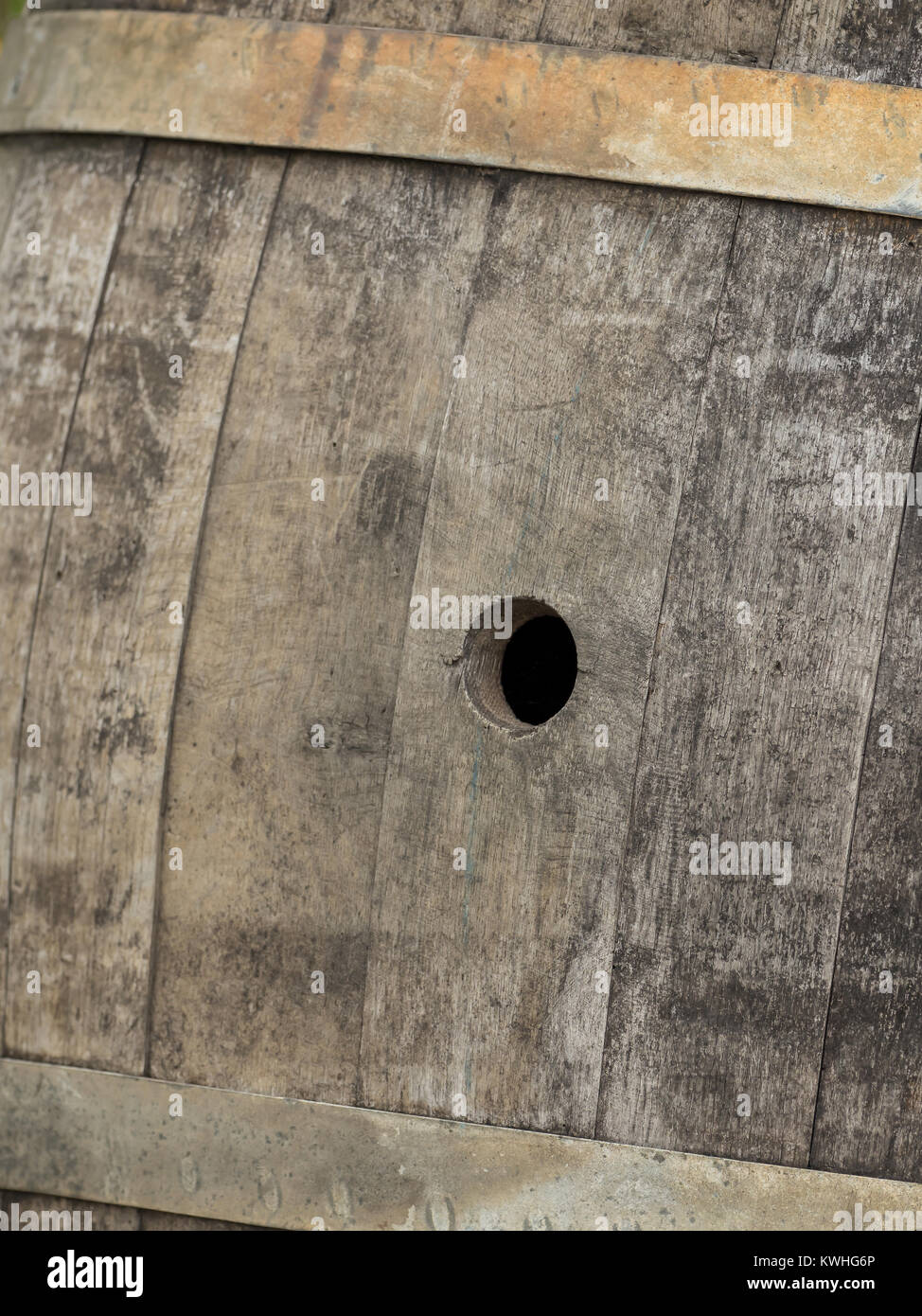 Old wooden barrel with a hole Stock Photo - Alamy