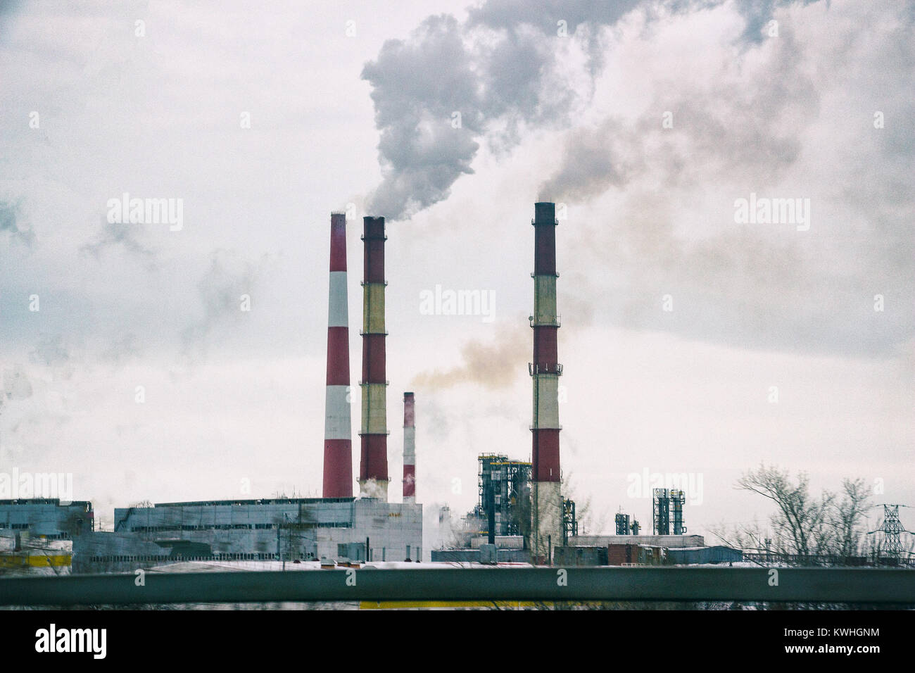 Smoking chimneys of the plant. Fuming chimney of a factory Stock Photo ...