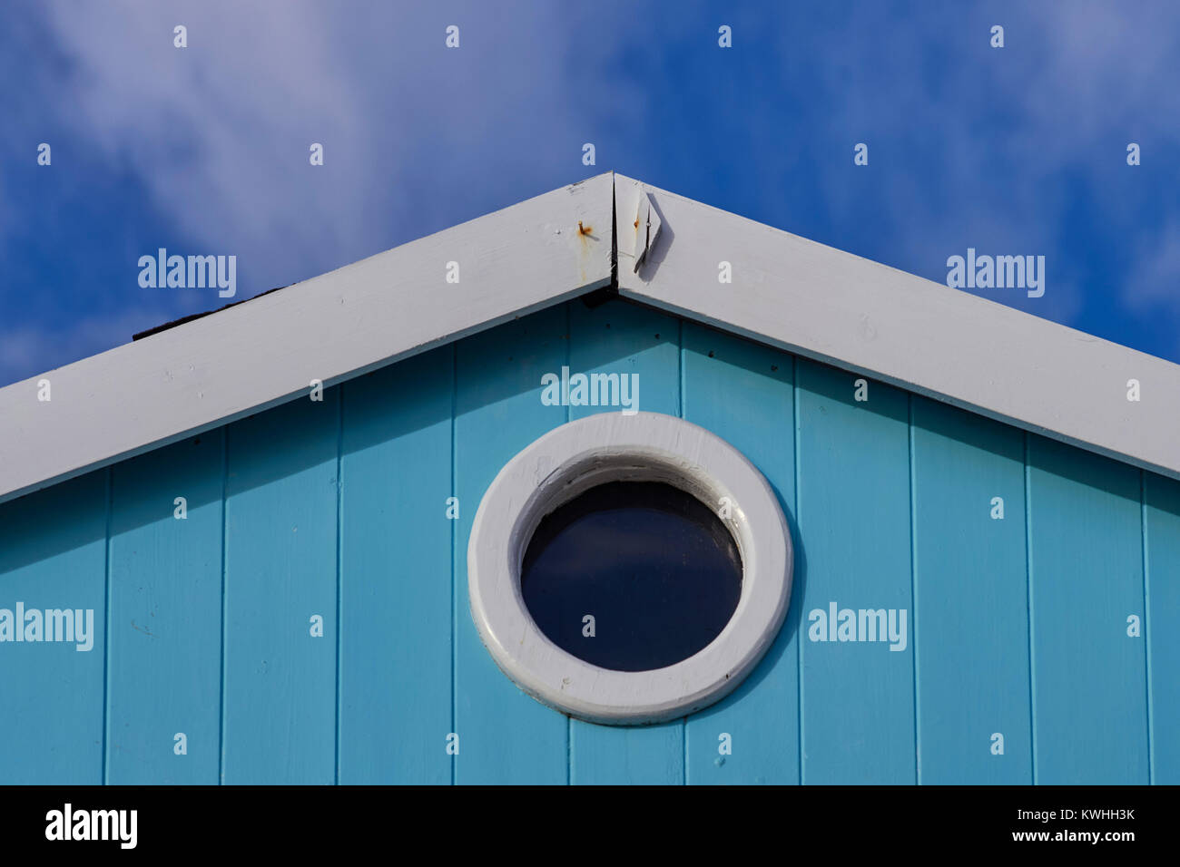 Porthole window detail on a beach hut in Clacton Stock Photo - Alamy