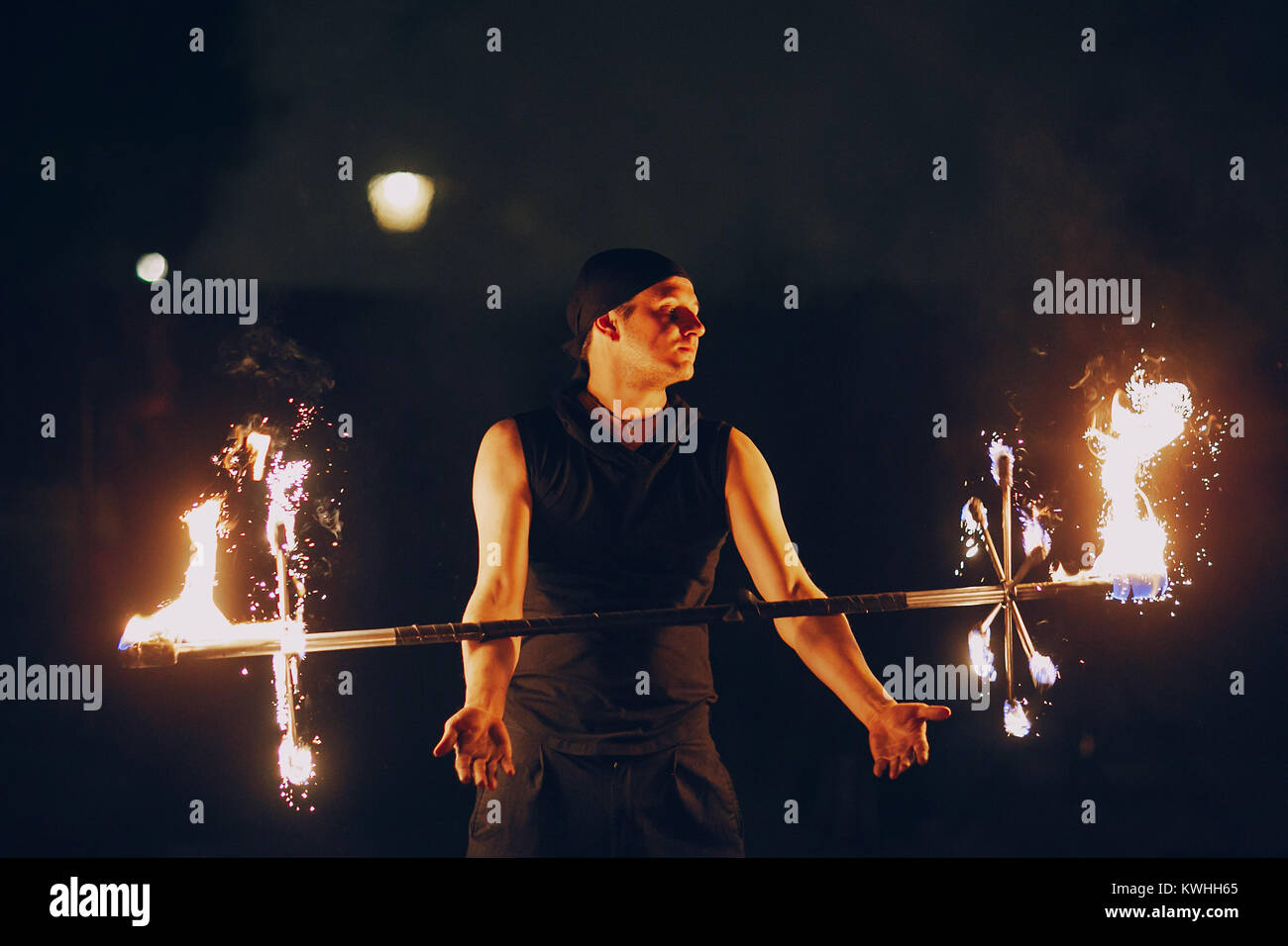 man doing tricks with fire Stock Photo - Alamy