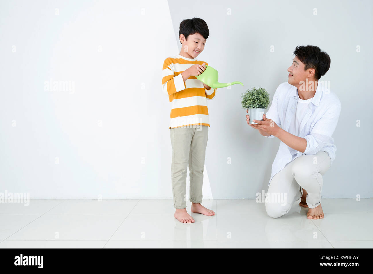 RF photo - Dad and little son isolated shot in studio 383 Stock Photo ...