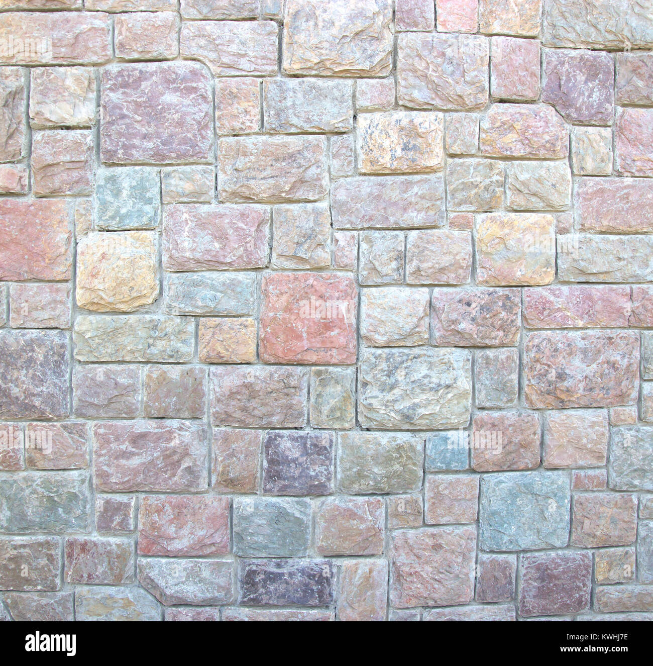 Background of stone wall made with blocks Stock Photo - Alamy