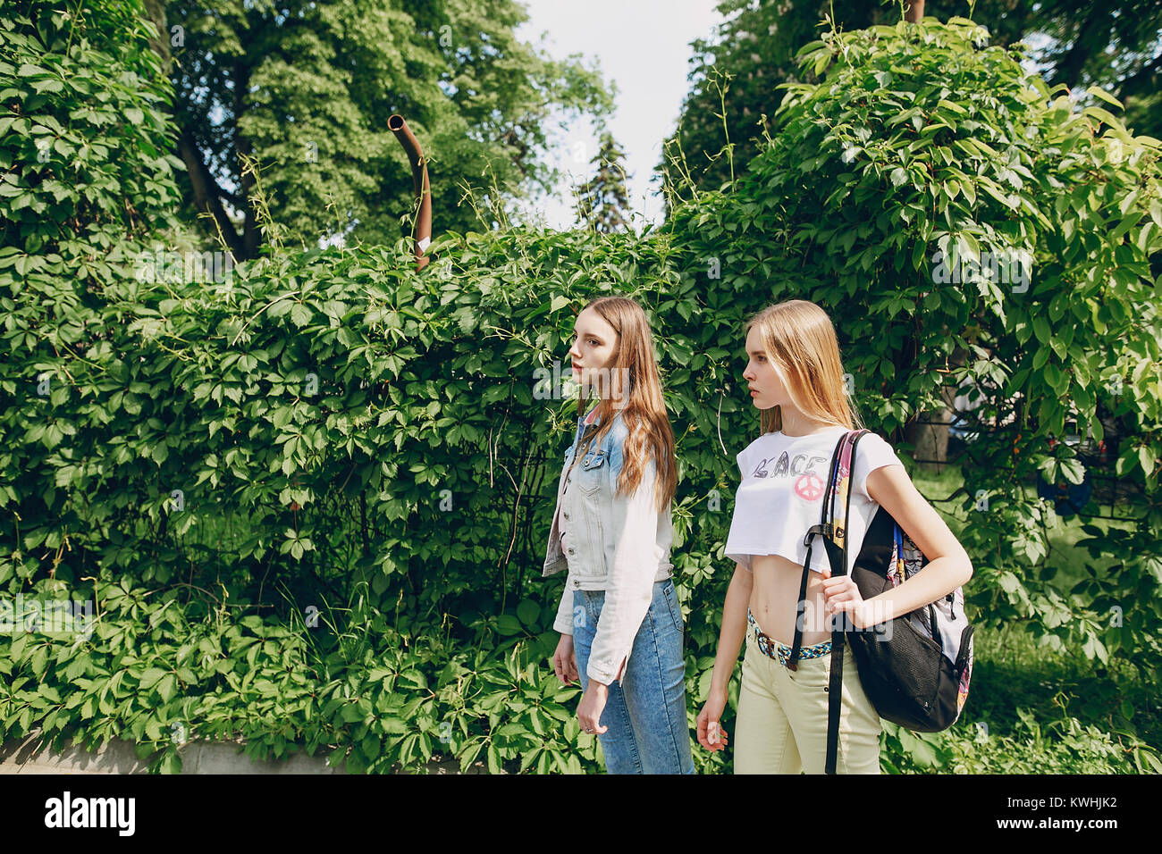 beautiful models pose for a photo in trendy clothes Stock Photo - Alamy