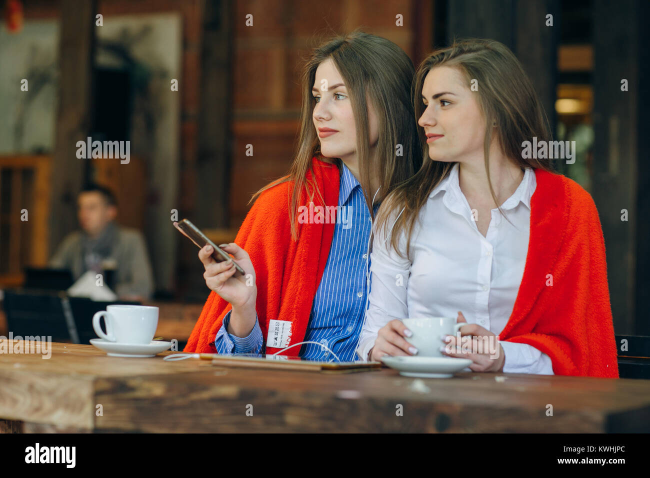 two girls in a cafe Stock Photo - Alamy