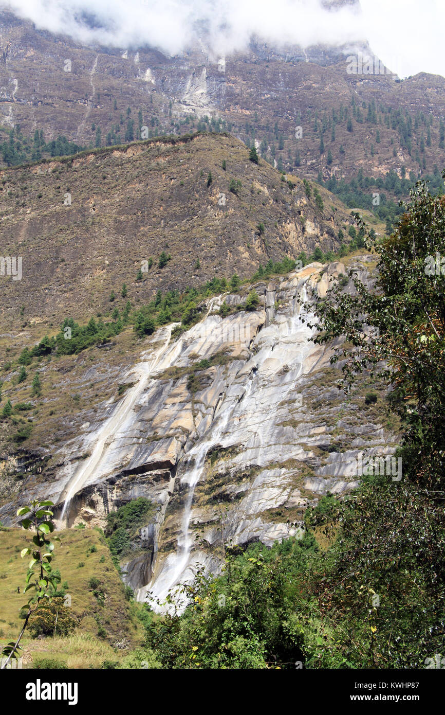 Waterfall and rock in mountain in Nepal Stock Photo - Alamy