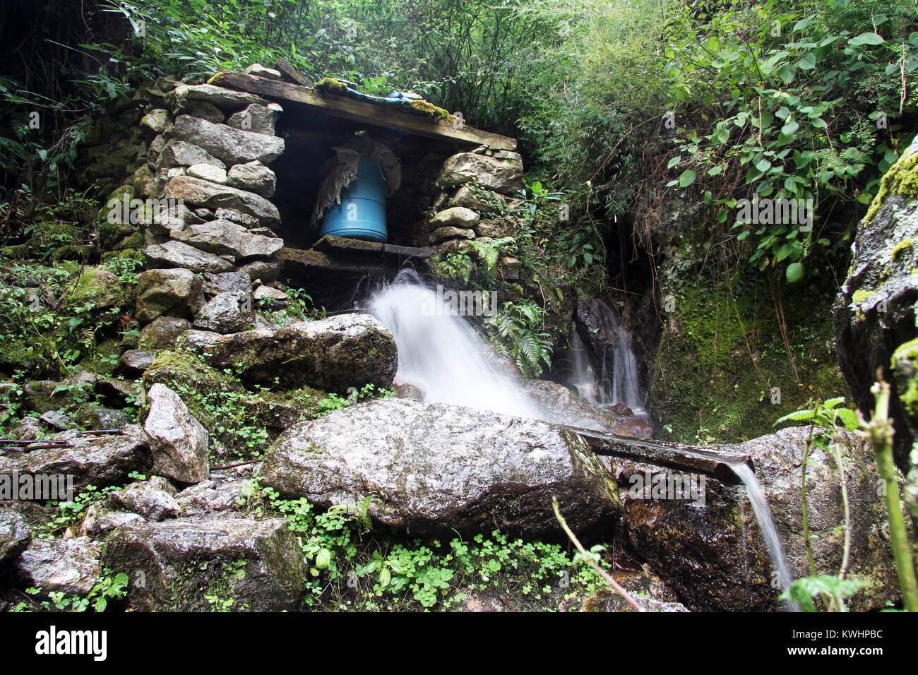 Water mill in the forest in Nepal Stock Photo - Alamy