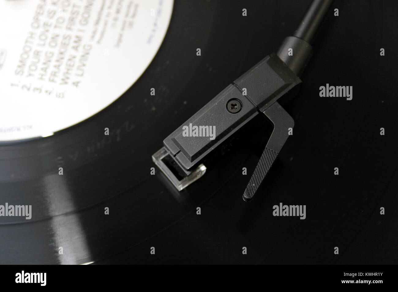close up shot of a stylus needle playing on a vinyl record Stock Photo ...