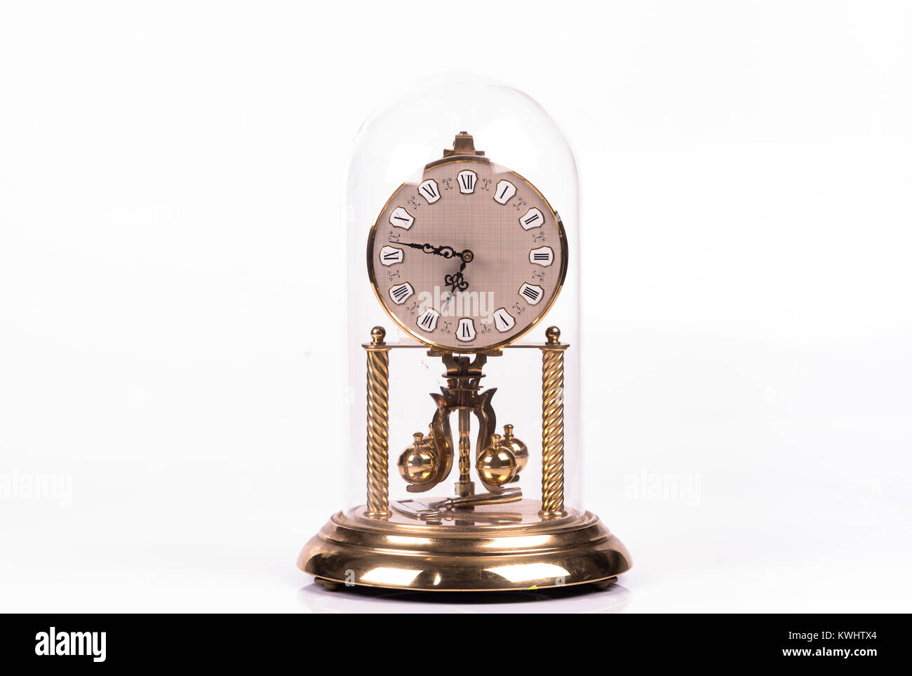 Clock Table Watch Crystal Glass Dome over a white background Stock ...
