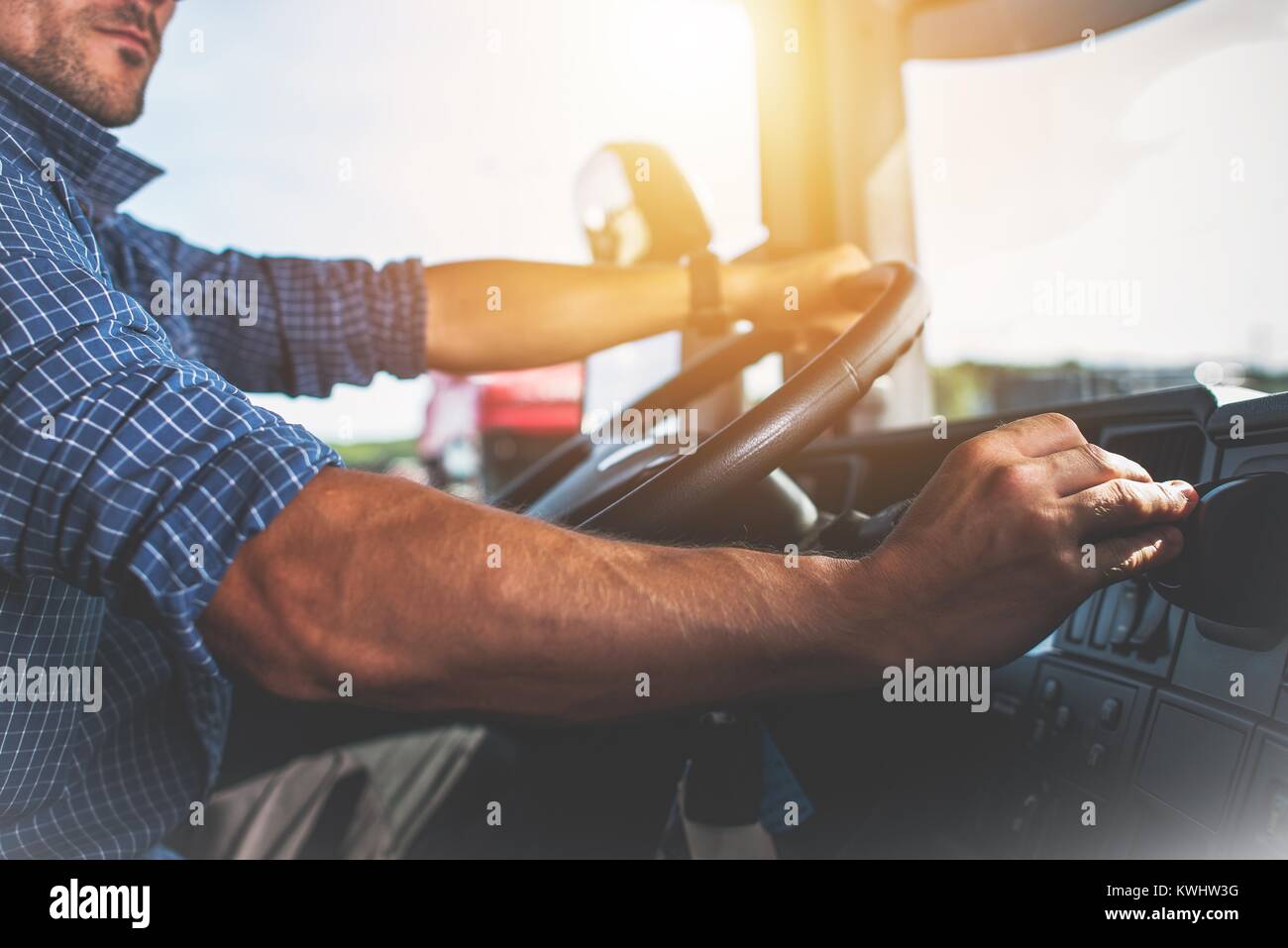 Semi Truck Driver Job. Caucasian Trucker Preparing For Long Haul ...