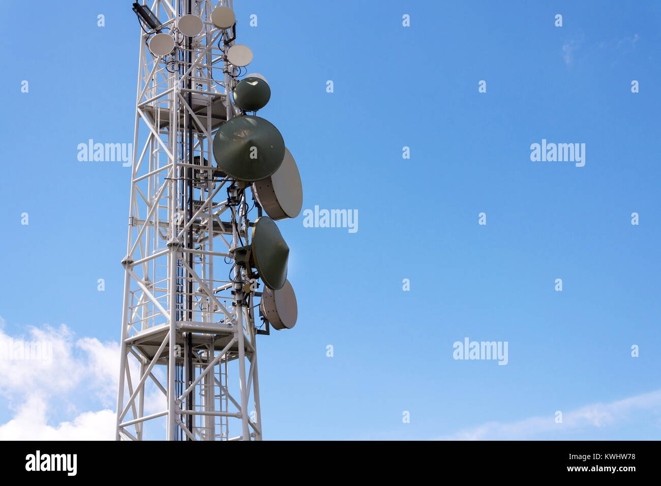 Transmitters and aerials on telecommunication tower, wireless communication concept Stock Photo ...
