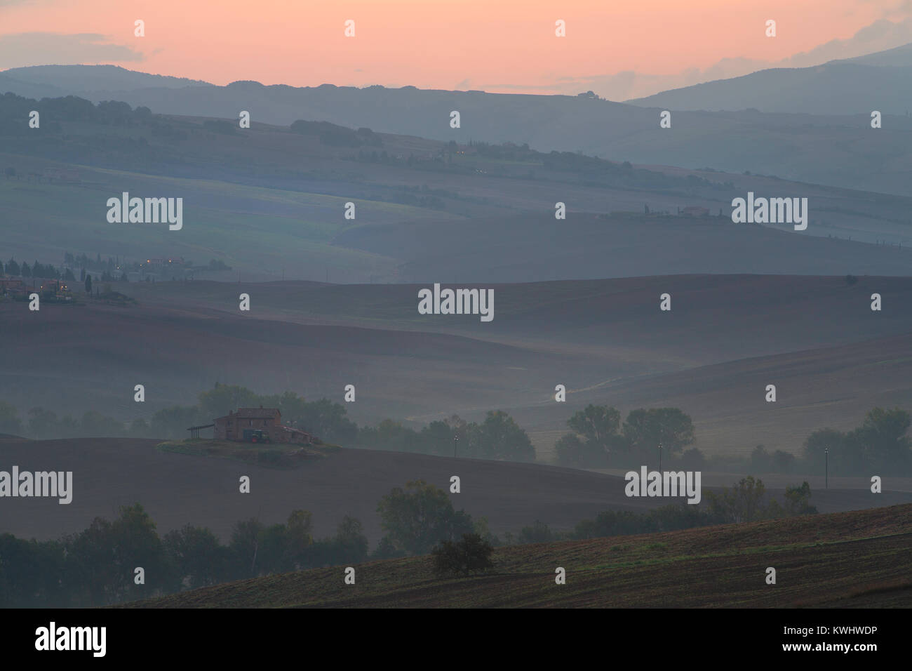 Early morning light on the layers of Tuscan fields. Italy Stock Photo ...